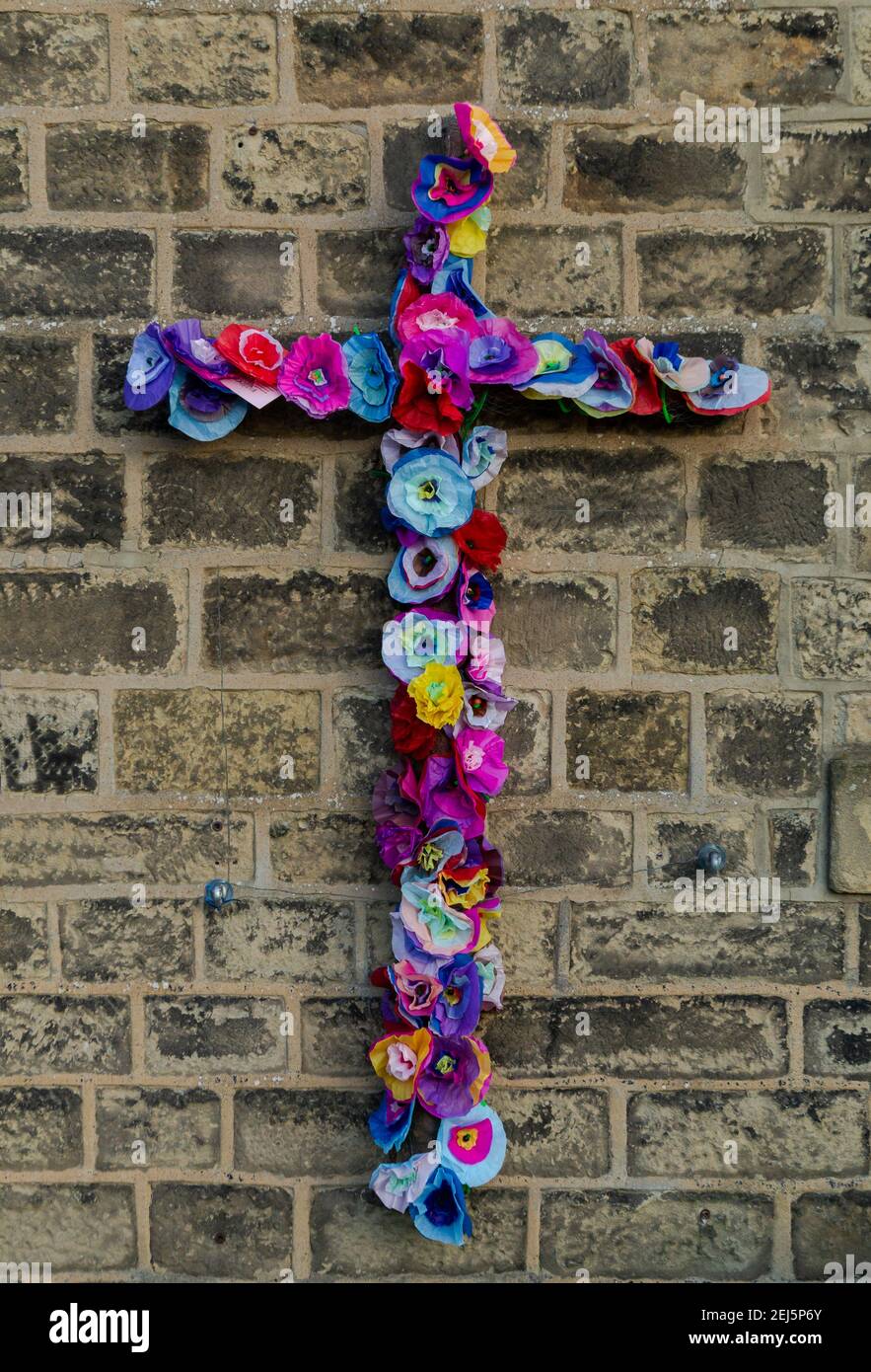 An Easter Christian Cross made out of paper flowers Stock Photo - Alamy