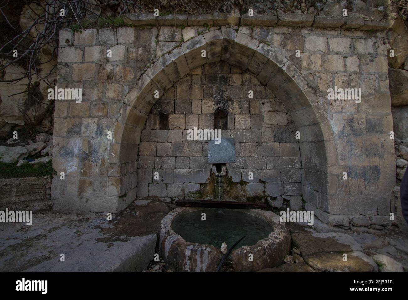 February 21, 2021: An old water spring in the village of Badama in the ...