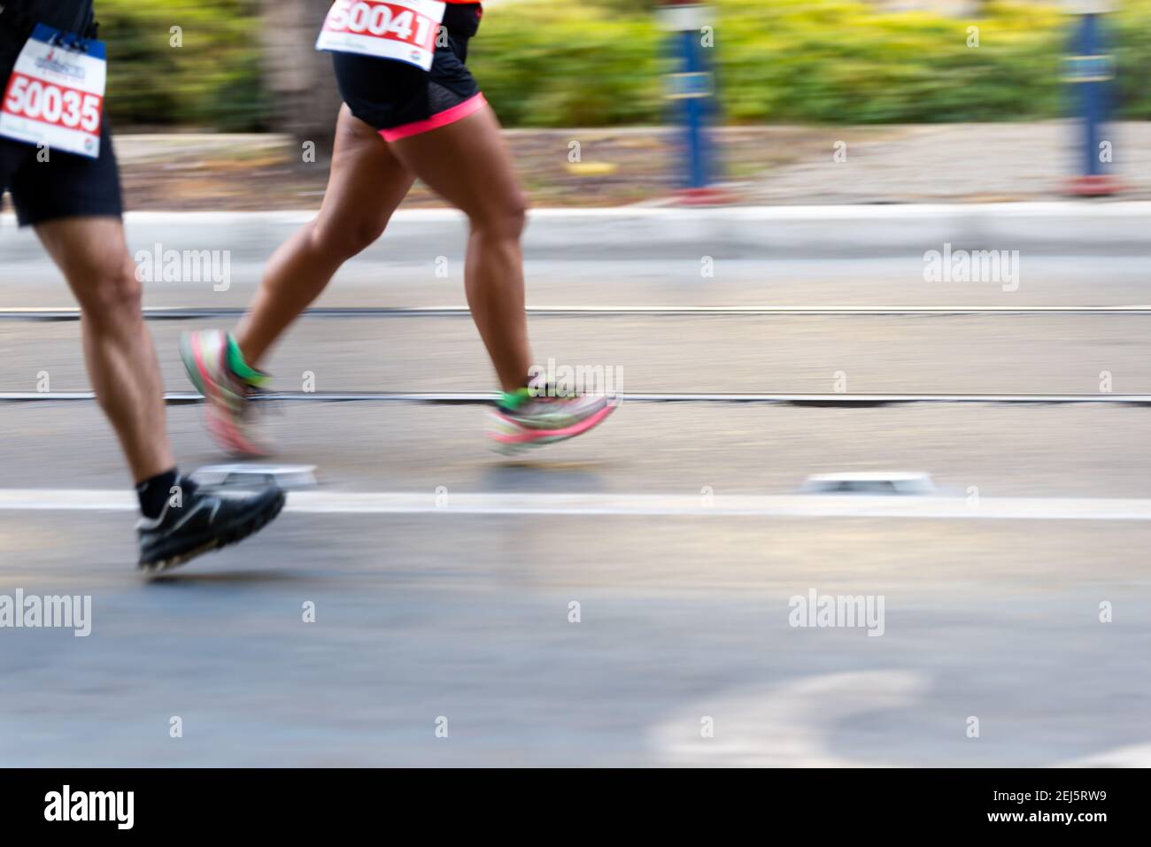 Izmir, Turkey - October 04, 2020. Running mans legs with track shoes ...