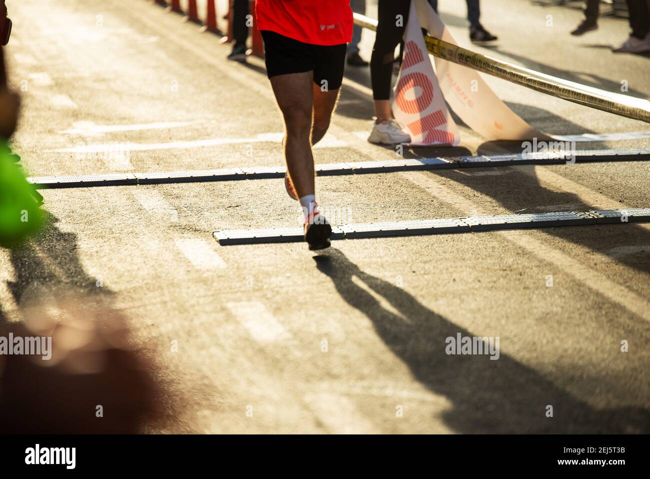 Izmir, Turkey - October 04, 2020. Running mans legs with track shoes ...