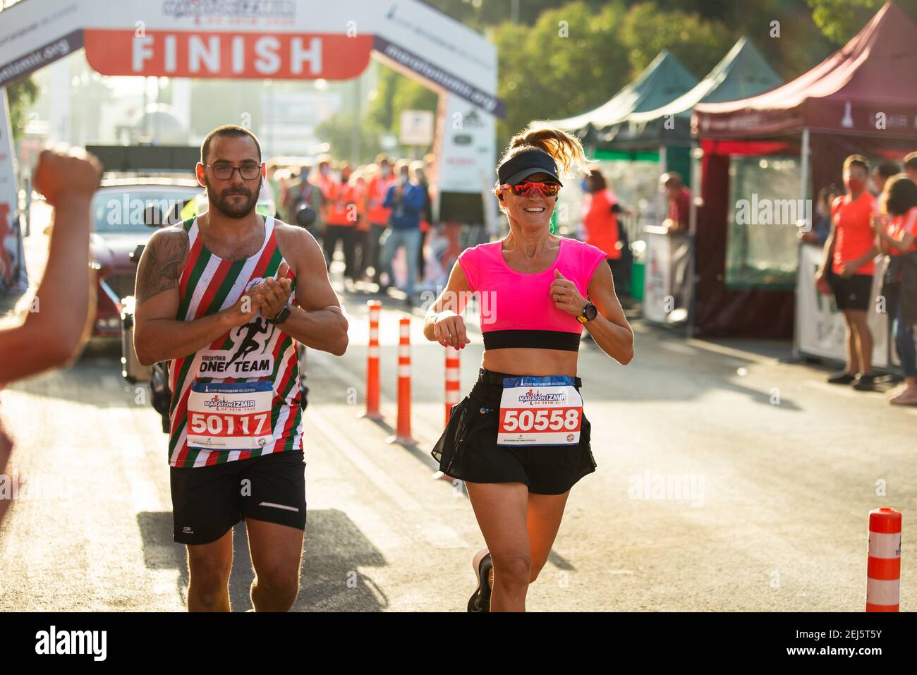 Izmir, Turkey - October 04, 2020. Running people at Finish line ...
