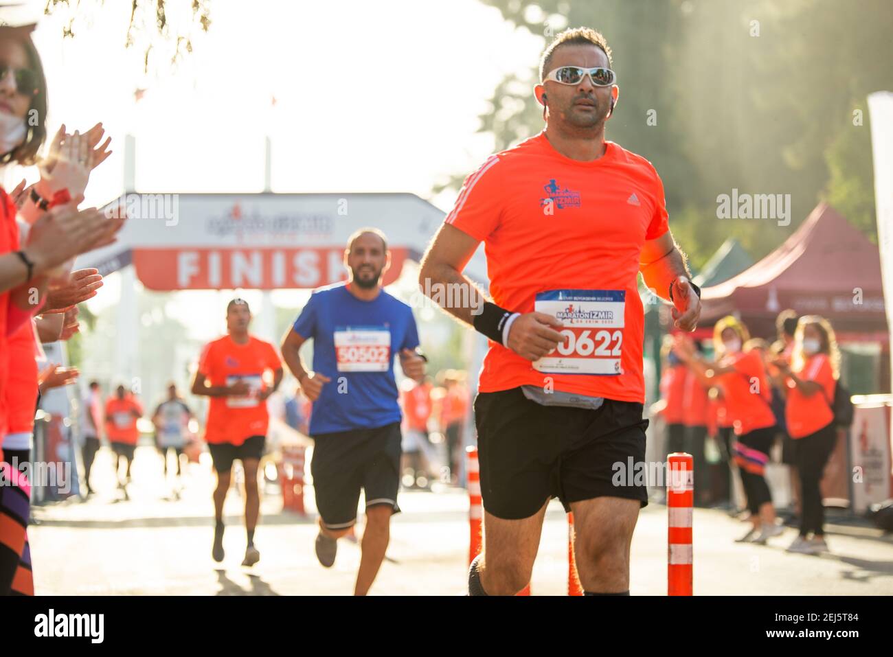 Izmir, Turkey - October 04, 2020. Running people at Finish line ...