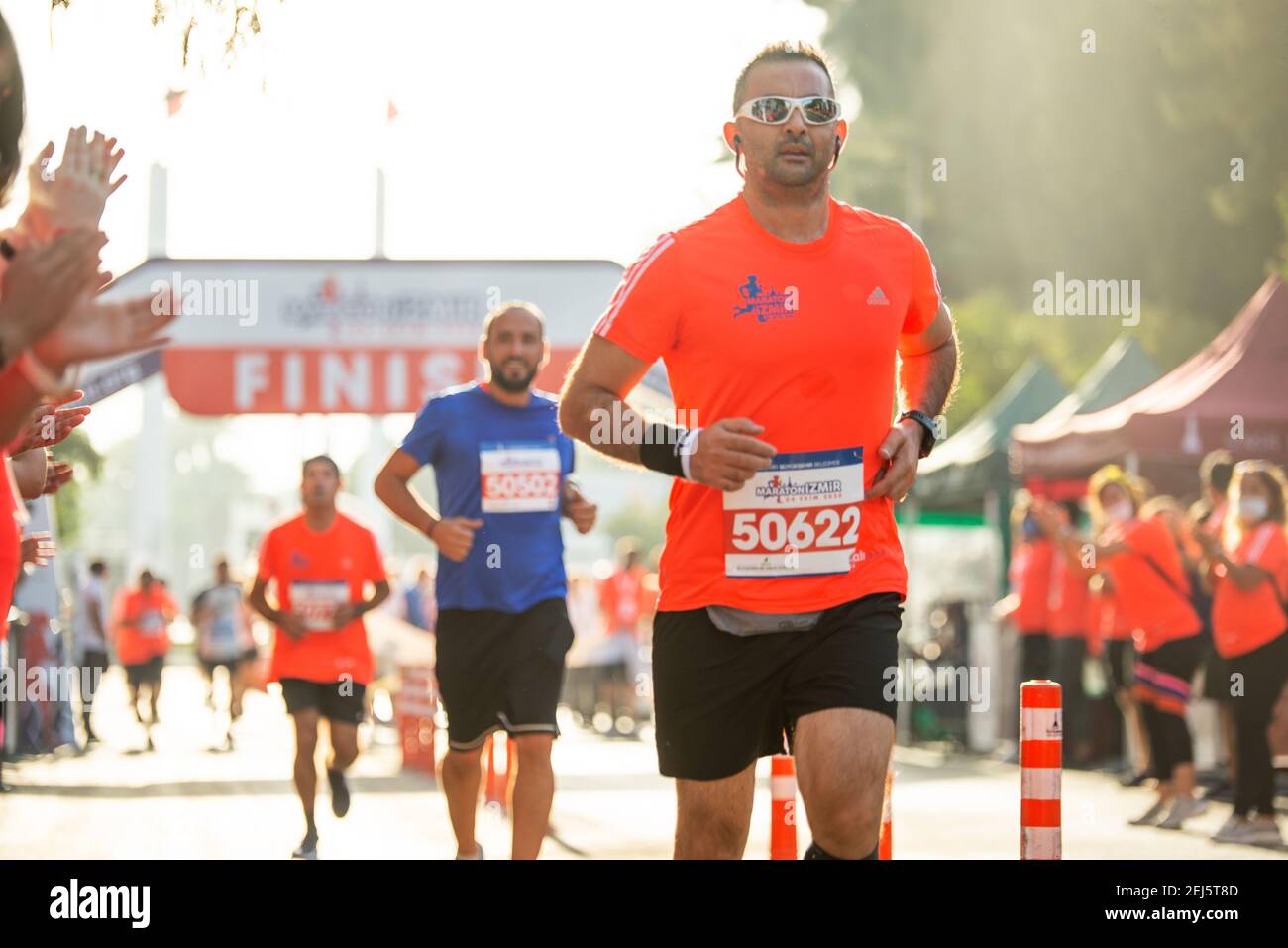 Izmir, Turkey - October 04, 2020. Running people at Finish line ...