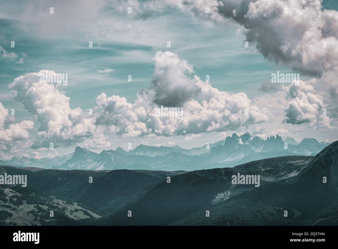 panoramic view of the Dolomites with beautiful weather clouds , Italy ...