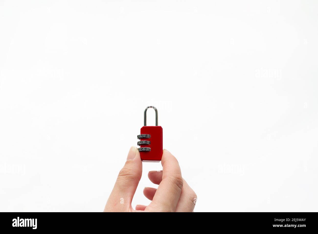 Padlock in the hand on white, close up. Cropped Hand Holding Padlock ...