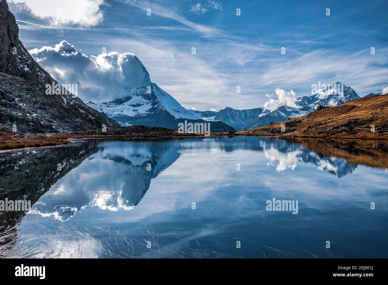 Blue water reflection of matterhorn in riffelsee hi-res stock ...