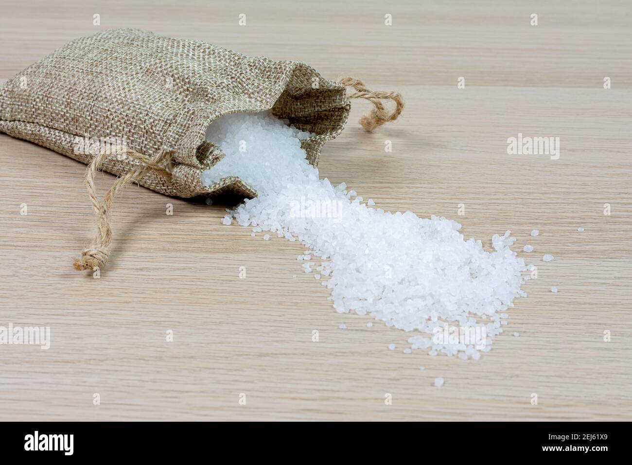 Coarse salt in a linen bag Stock Photo - Alamy