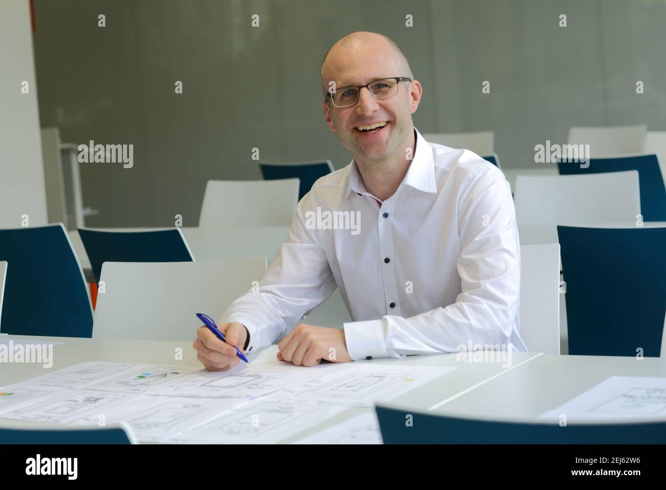 Businessman reviewing paperwork in hi-res stock photography and images ...