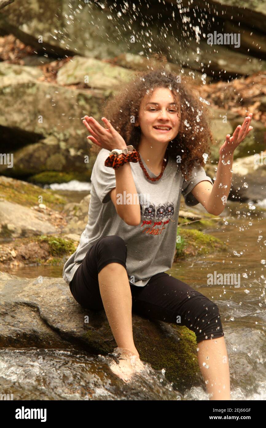Child playing splash park hi-res stock photography and images - Alamy
