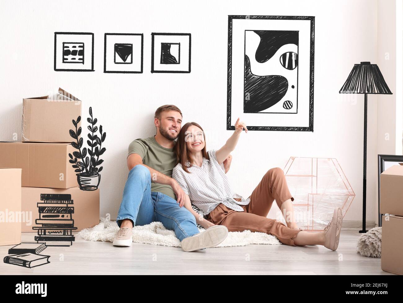 Young couple planning design of their new house Stock Photo - Alamy
