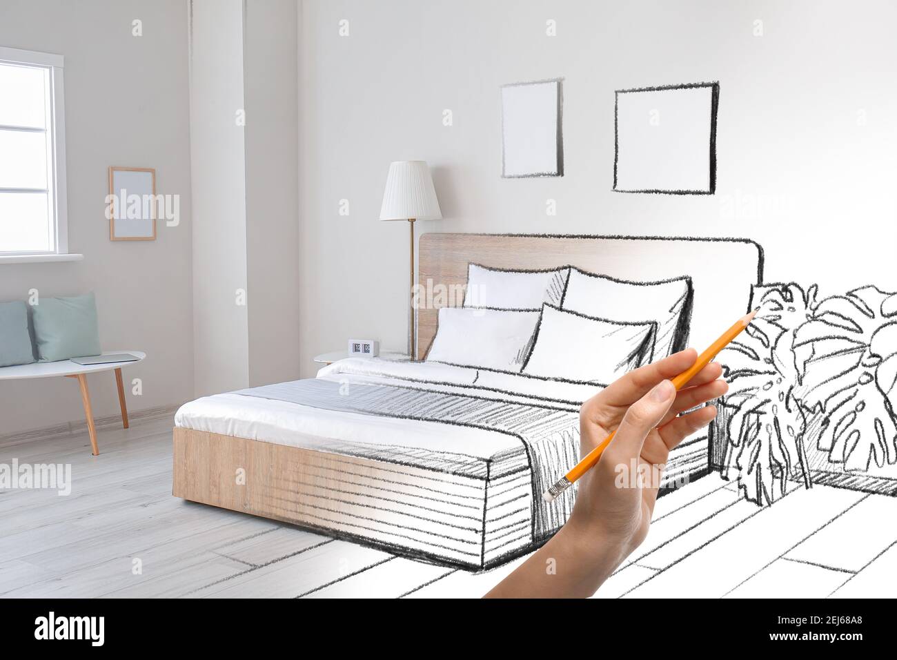 Designer drawing new interior of bedroom Stock Photo - Alamy