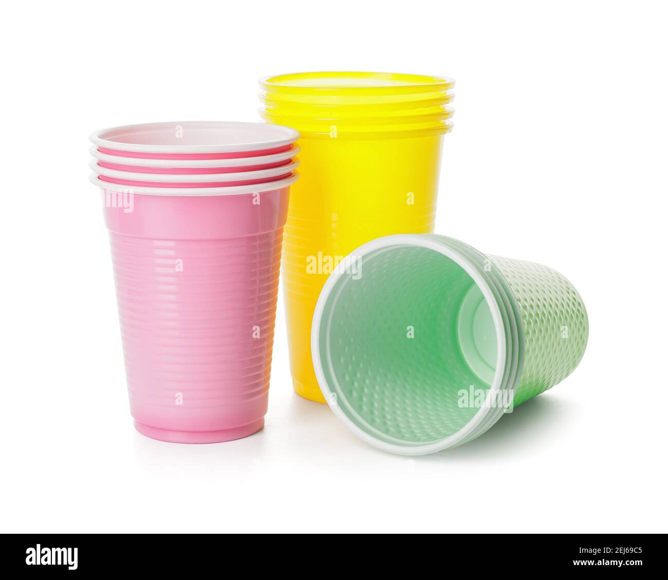 Plastic cups on white background Stock Photo - Alamy