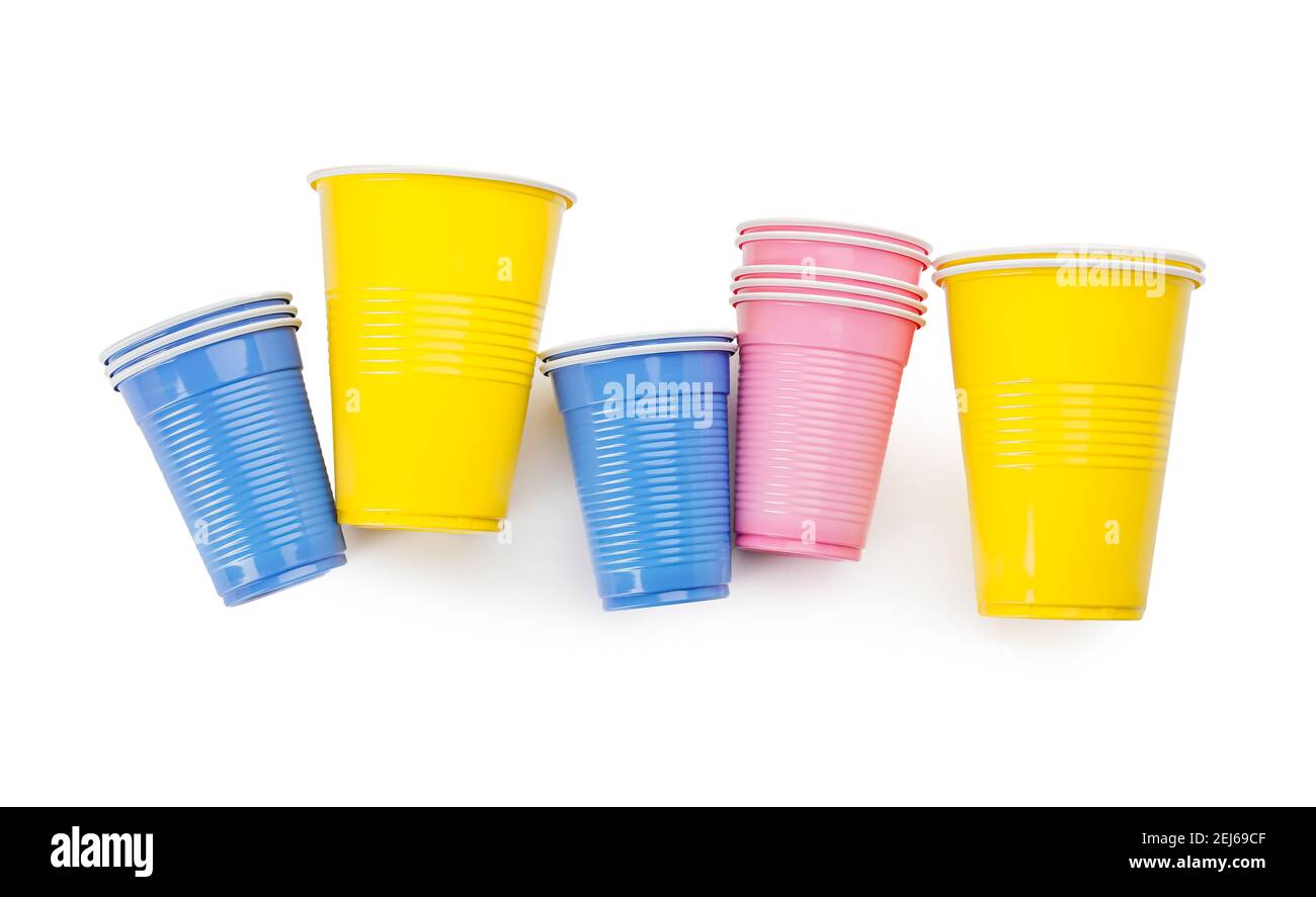 Plastic cups on white background Stock Photo - Alamy