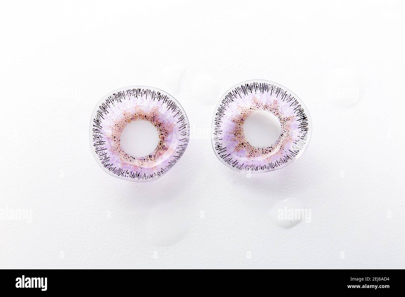 Contact lenses on white background Stock Photo - Alamy