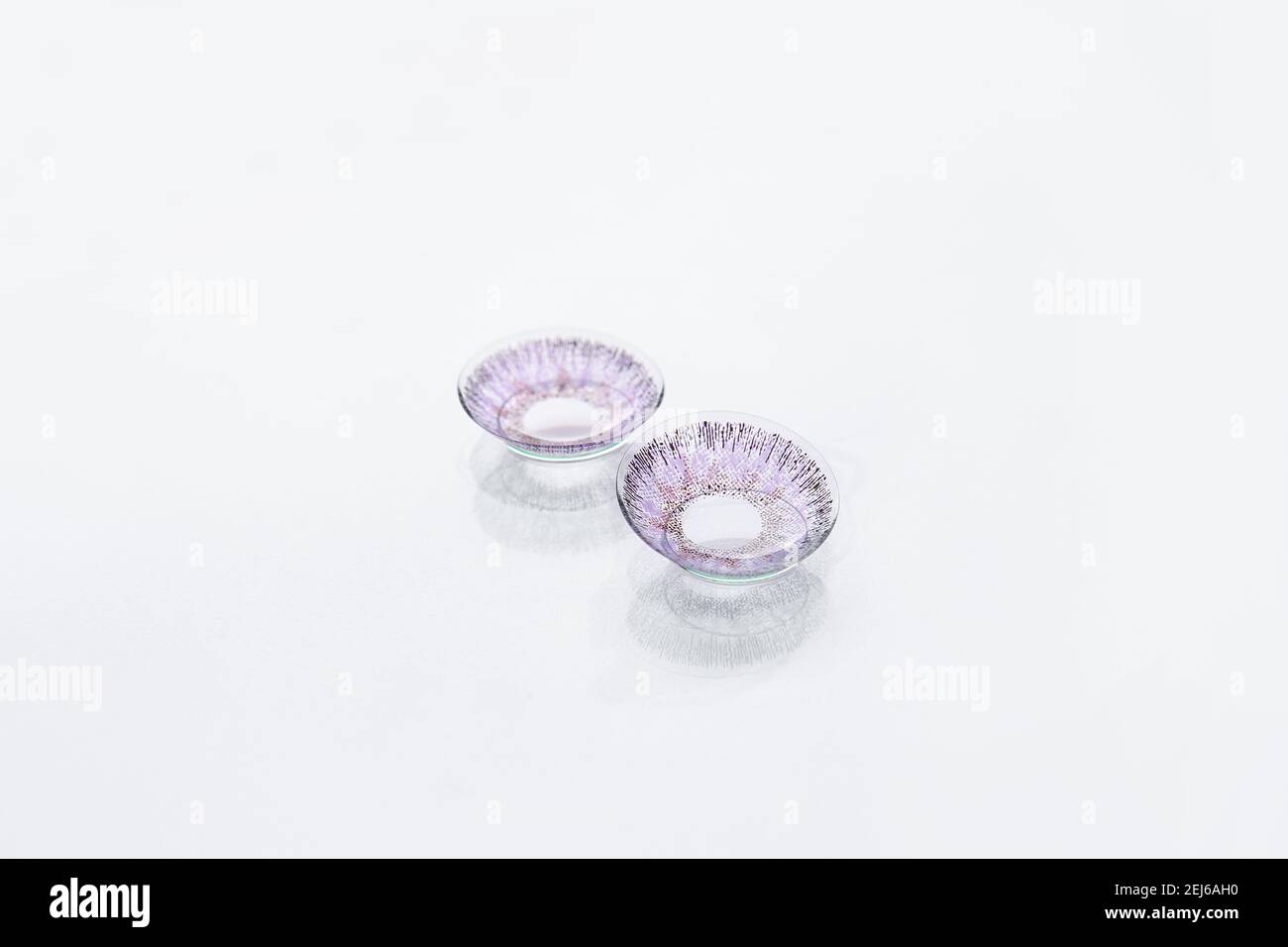 Contact lenses on white background Stock Photo - Alamy