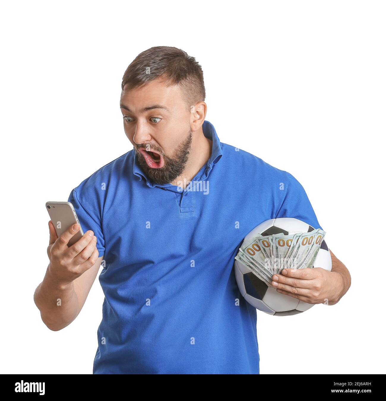 Surprised man after winning of his sports bet on white background Stock ...