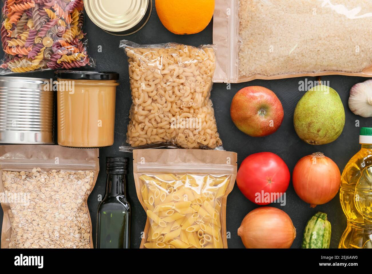 Different products on dark background Stock Photo - Alamy