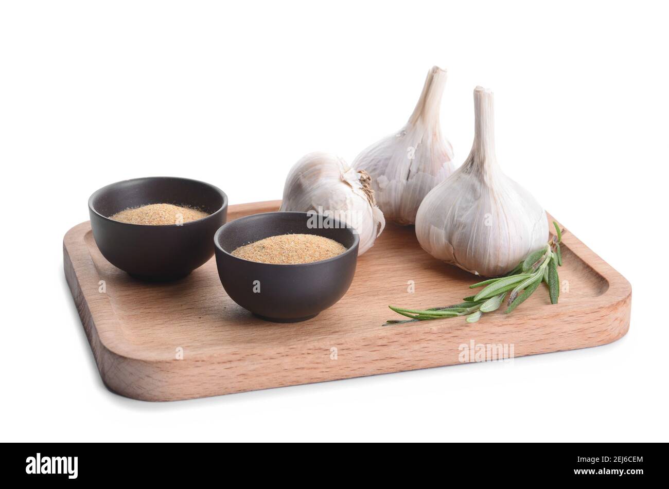 Bowls with aromatic powdered garlic on white background Stock Photo - Alamy