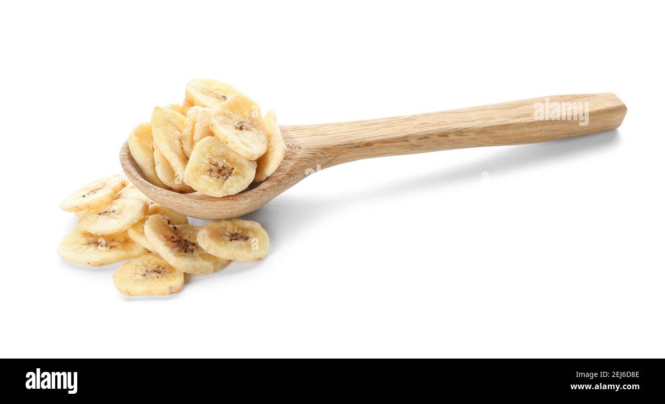 Wooden spoon with crispy banana chips on white background Stock Photo ...
