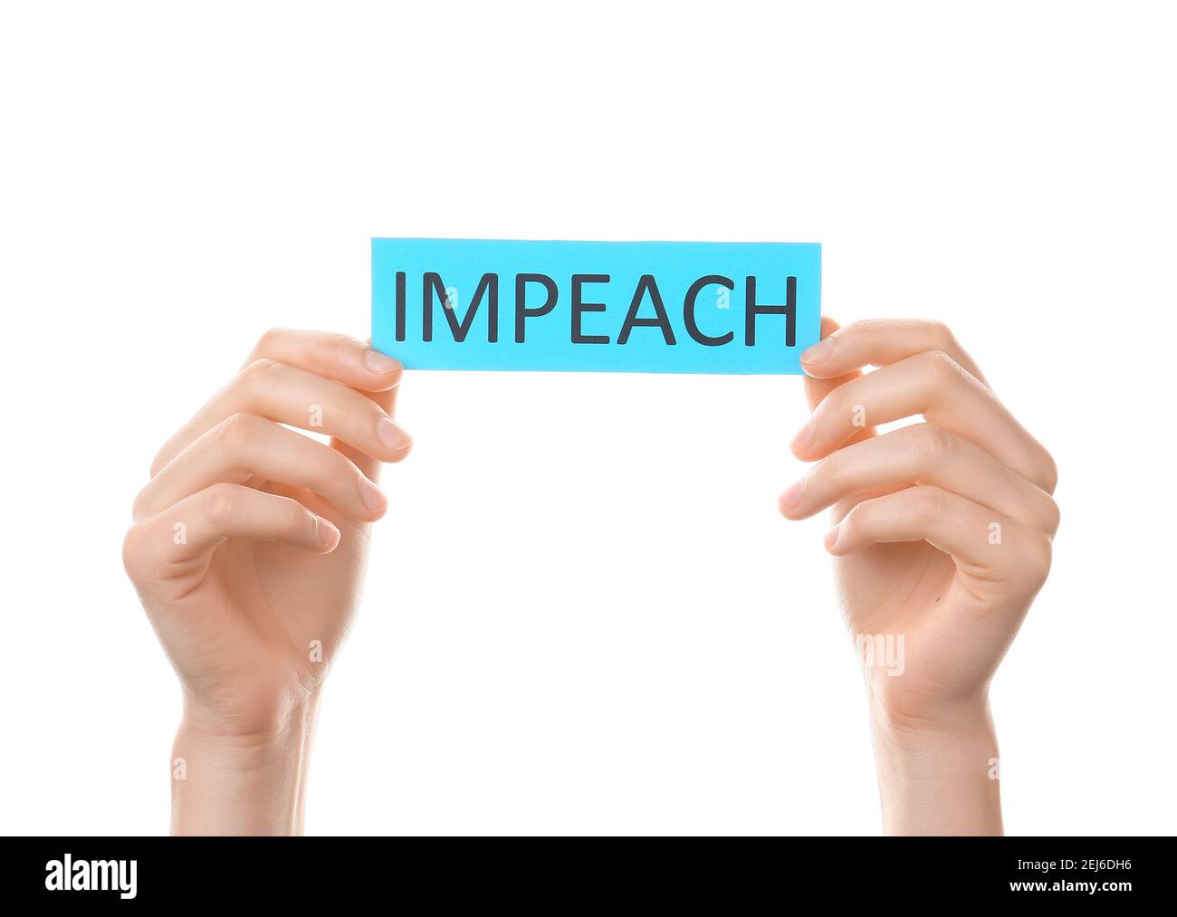 Hands holding paper with text IMPEACH on white background Stock Photo ...