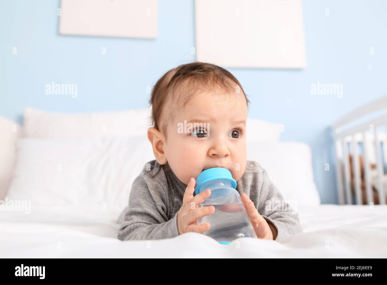 Cute baby boy drinking water hi-res stock photography and images - Alamy