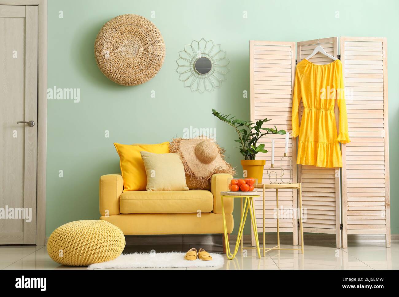 Interior of modern living room with stylish armchair Stock Photo - Alamy