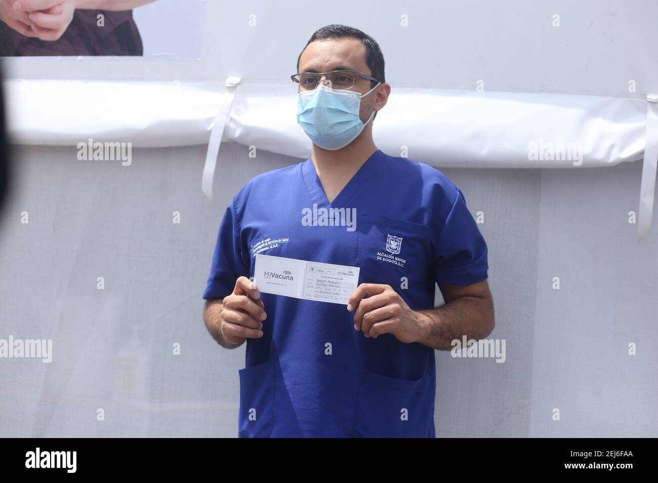 Person vaccinated with Pfizer-BioNTech Covid-19 shows the certificate ...