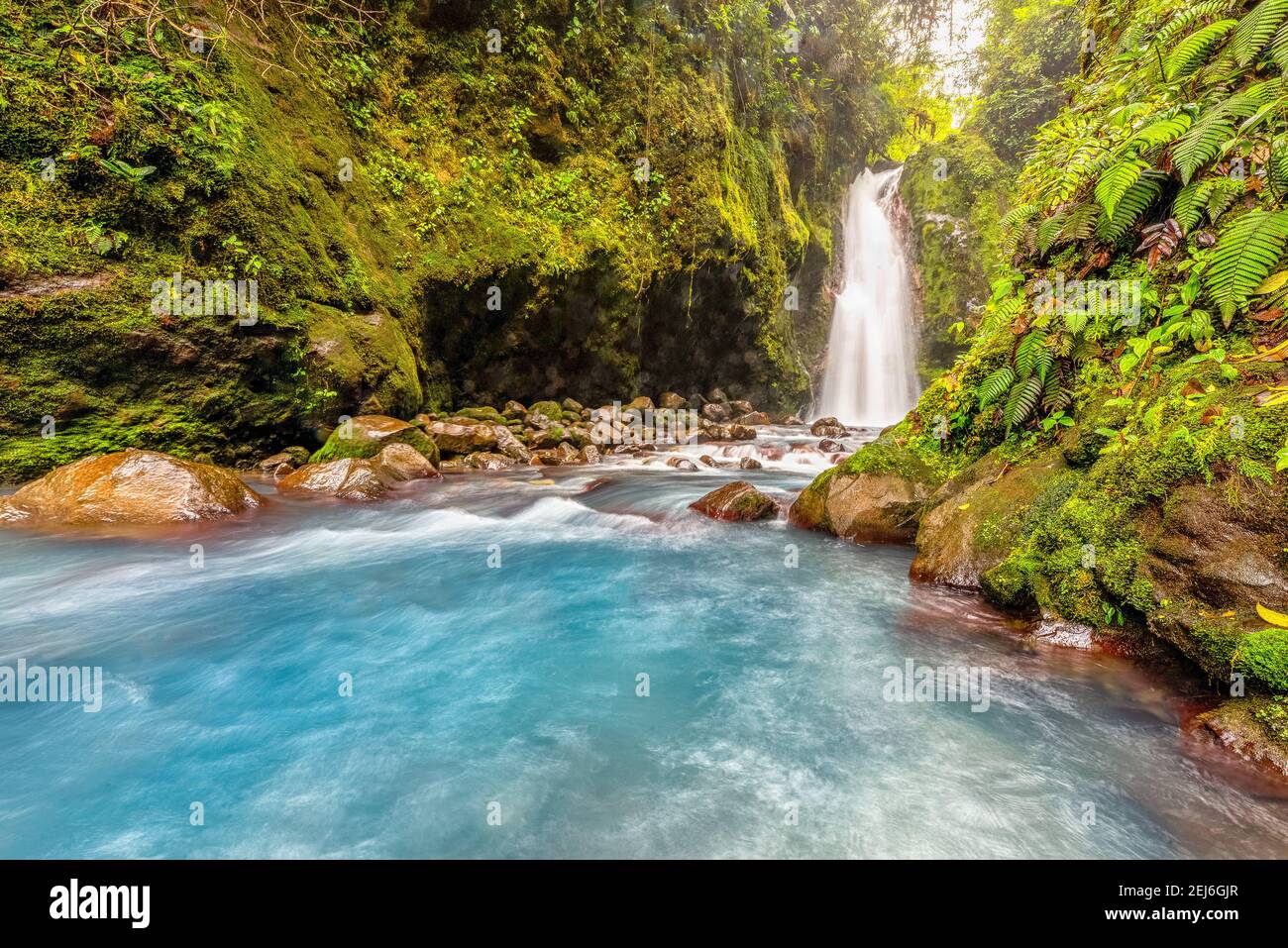 Blue water flowing through Gemelas waterfalls in Bajos del Toro, Costa ...