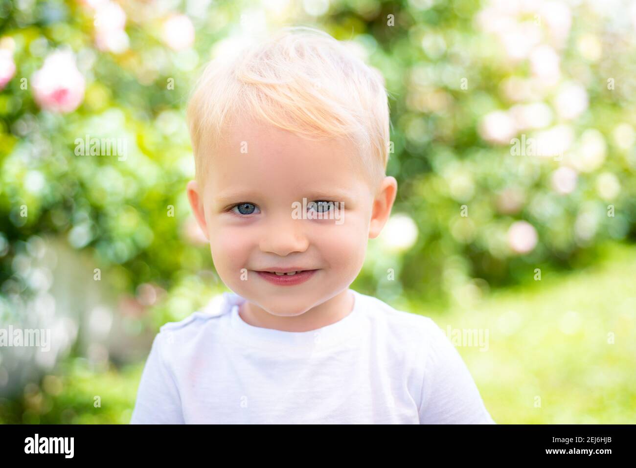 Cute smile kids face. Closeup portrait of smiling child boy on blur ...
