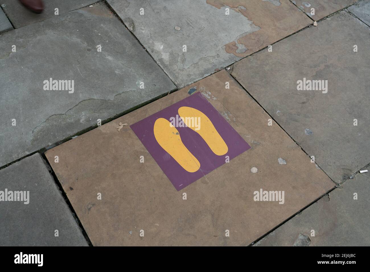 Social distancing footprint sainsbury's Stock Photo - Alamy