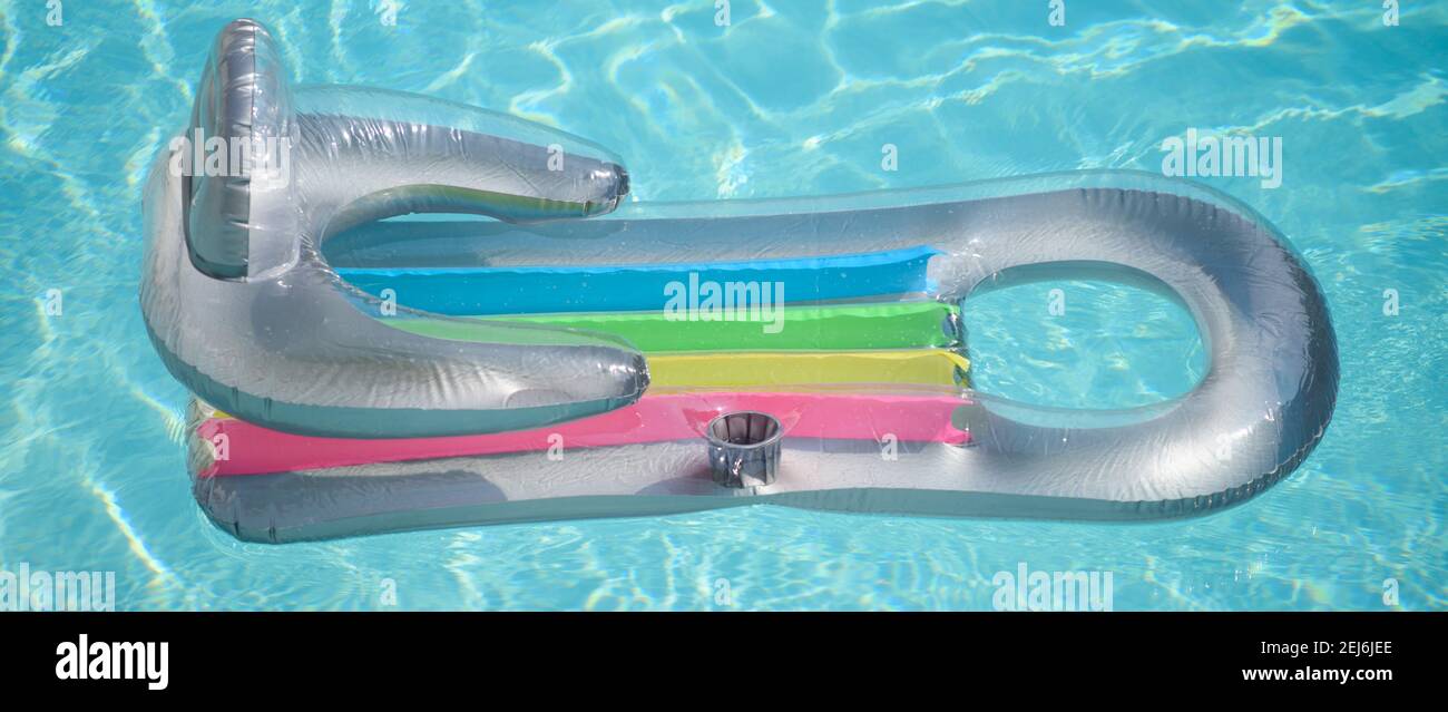 Inflatable mattress on sea water background. Summer vacation and travel ...