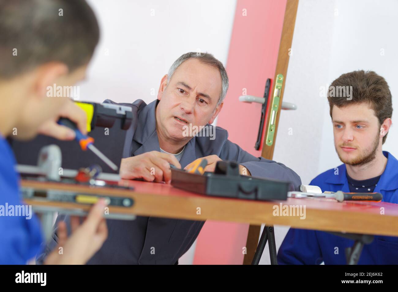 installing locking mechanism Stock Photo - Alamy
