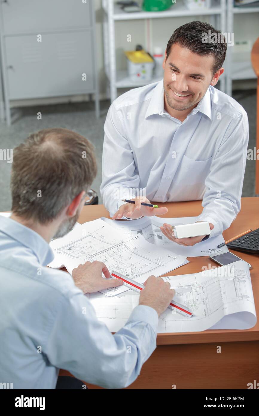 architect with a client during meeting Stock Photo - Alamy