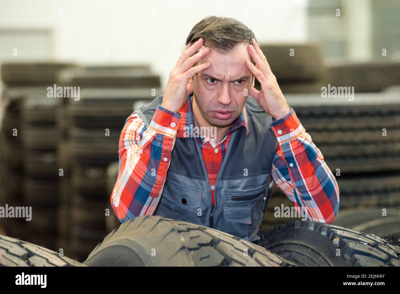 Vulcanizing shop worker hi-res stock photography and images - Alamy