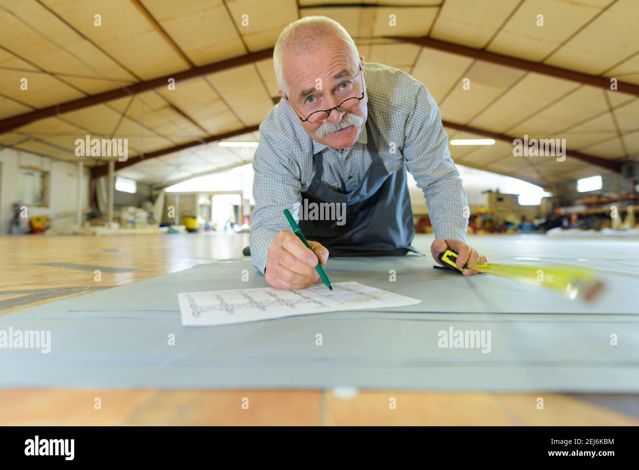 a senior man checking map Stock Photo - Alamy