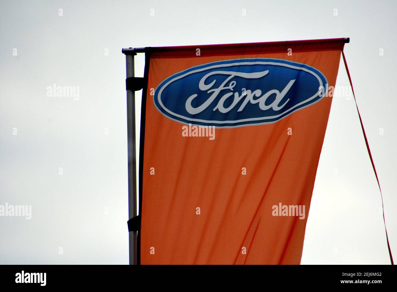 Ford company logo seen on one of their car dealerships showrooms ...
