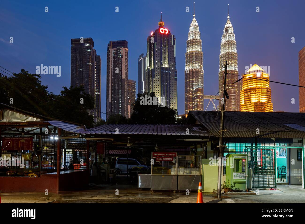 Night view of the Kuala Lumpur skyline featuring the Petronas twin ...