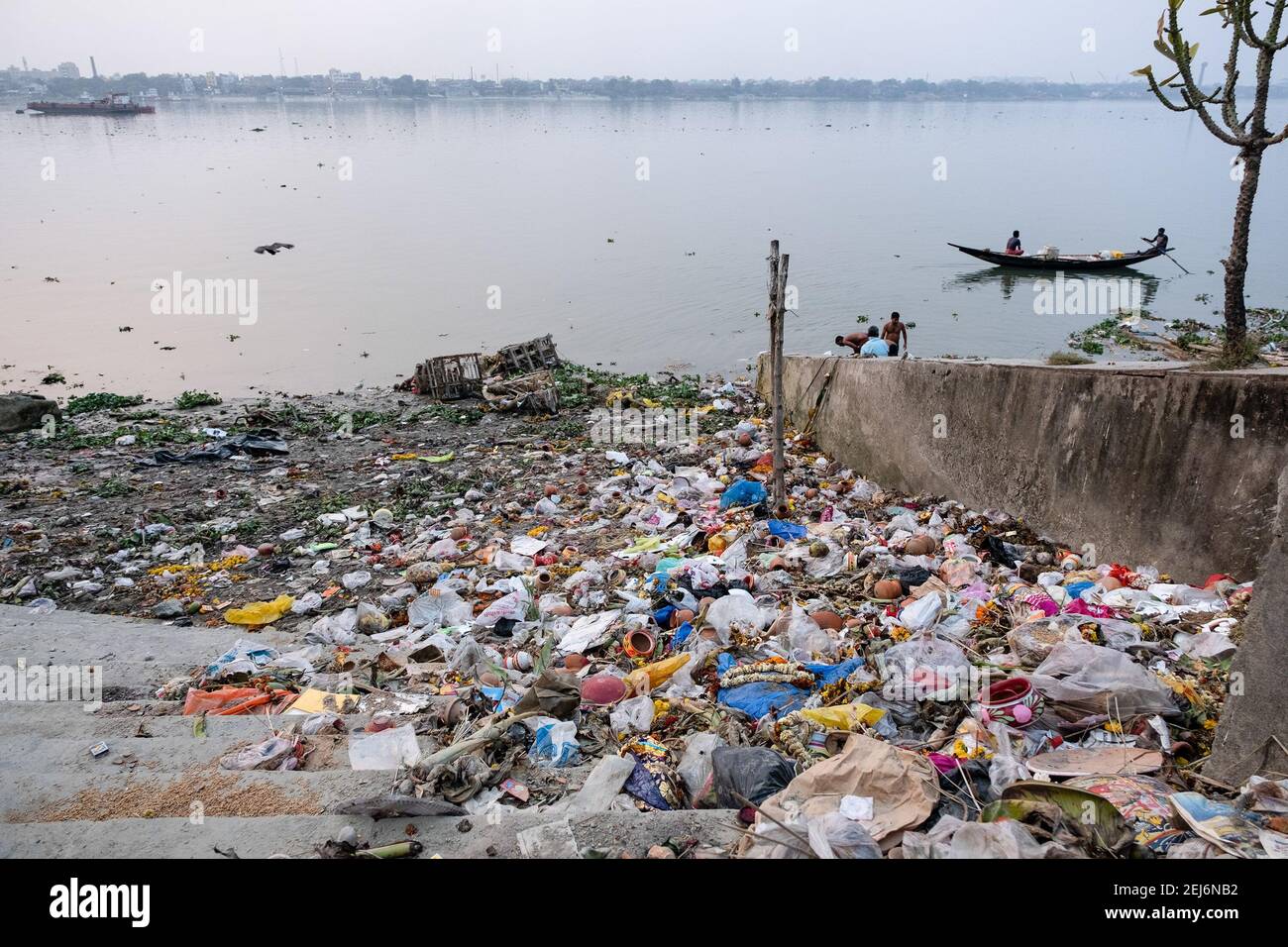 A view of the banks of holy river Ganga fully polluted by the garbage ...
