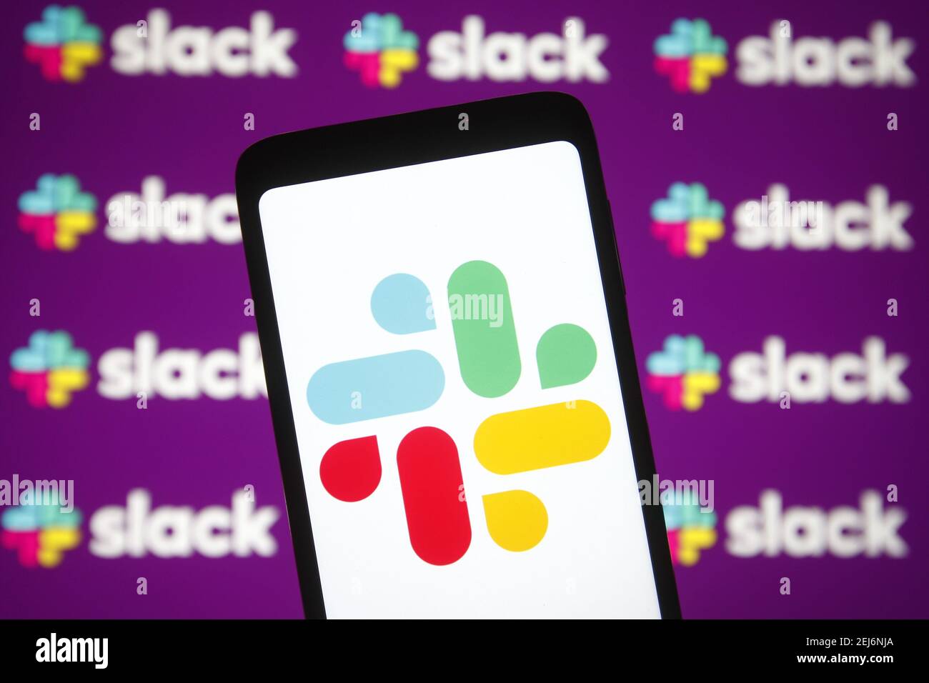 In this photo illustration a Slack logo of a business communication ...