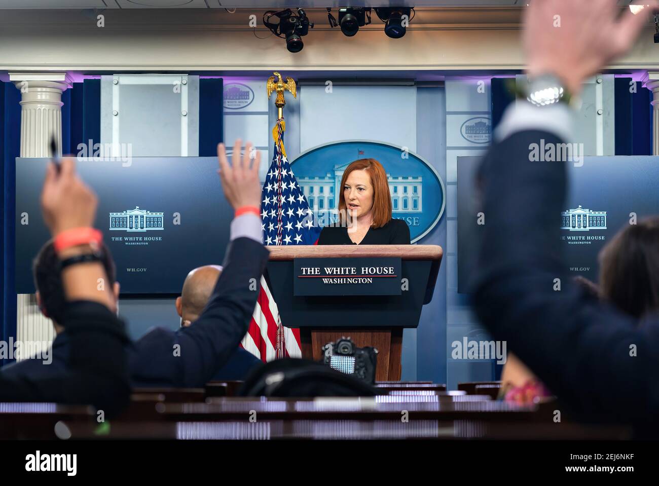 Press Secretary Jen Psaki takes questions from reporters during a press ...