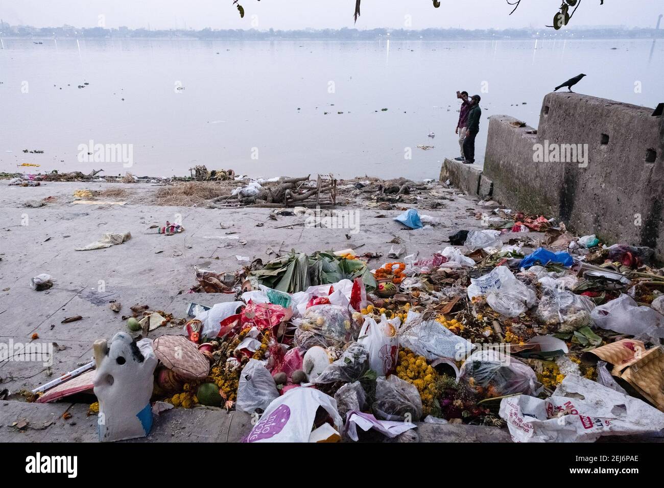 A view of the banks of holy river Ganga fully polluted by the garbage ...