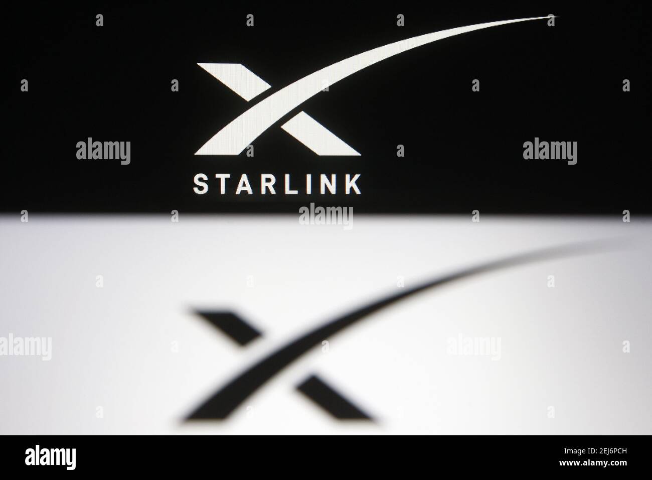 In this photo illustration a Starlink logo of a satellite internet ...