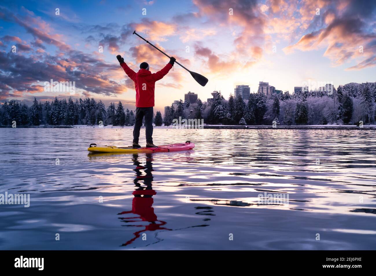 Adventurous male is paddle boarding near Stanley Park Stock Photo - Alamy