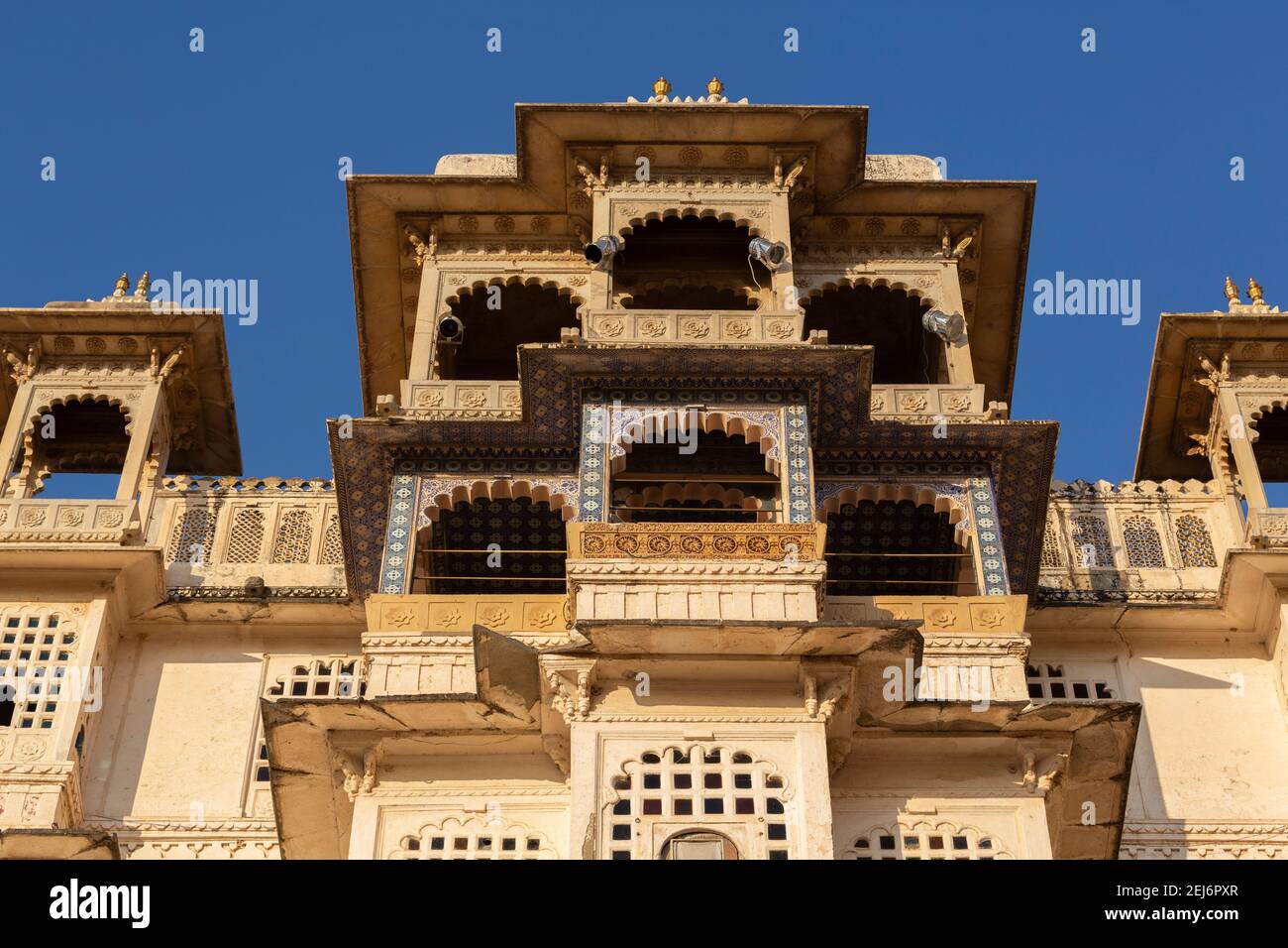 Udaipur, India, Front side of the City Palace with ornate balcony and ...