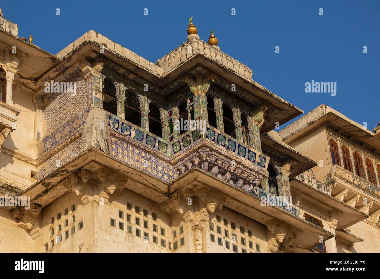Udaipur, India, Front side of the City Palace with ornate balcony and ...