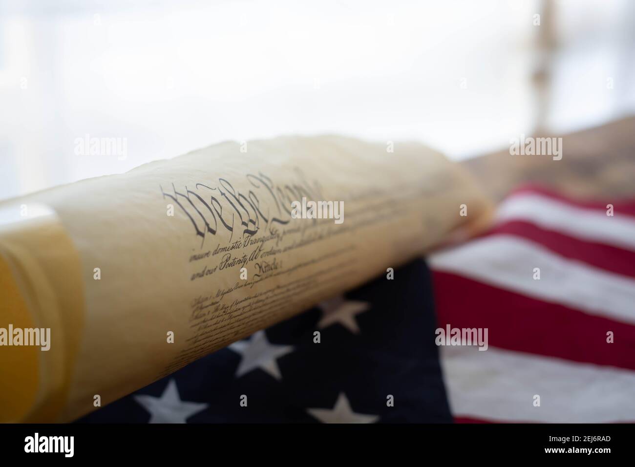 Constition of the USA with US flag Stock Photo - Alamy