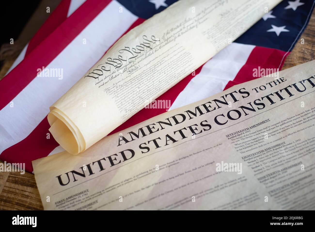 Constition of the USA with US flag Stock Photo - Alamy