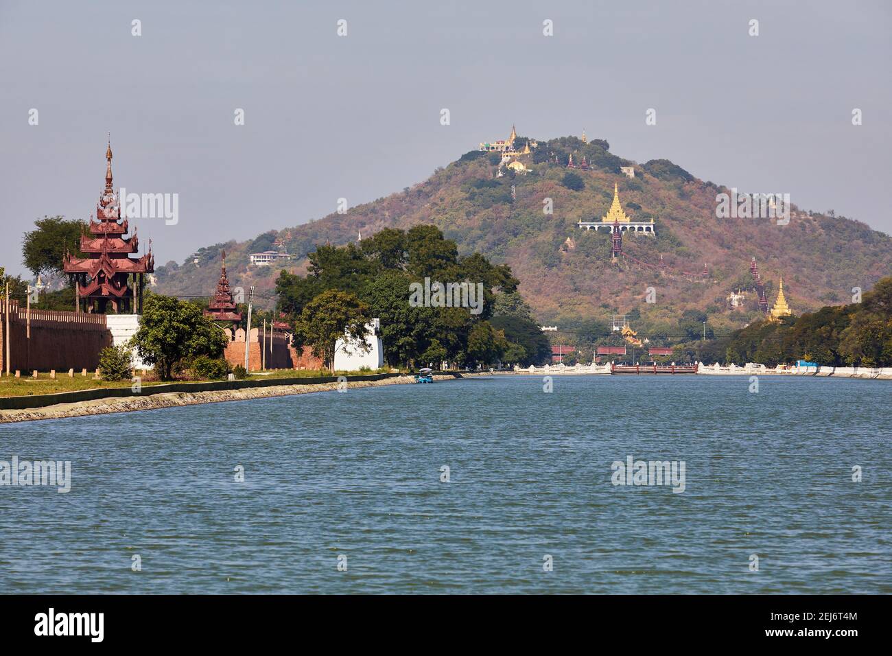 Palace moat and Mandalay Hill, Mandalay, Myanmar. The Su Taung Pyae ...