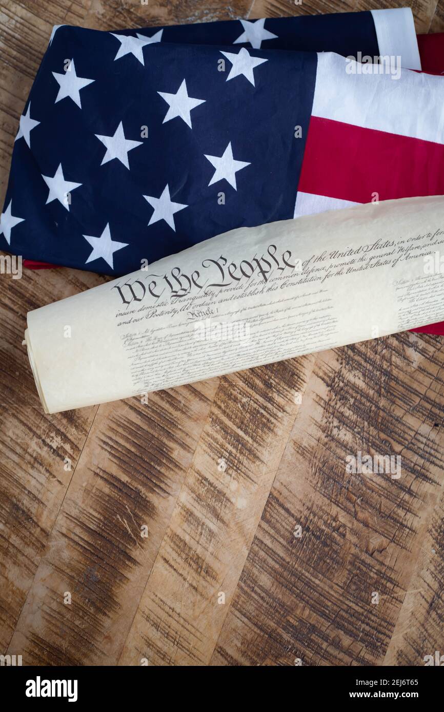 Constition of the USA with US flag Stock Photo - Alamy