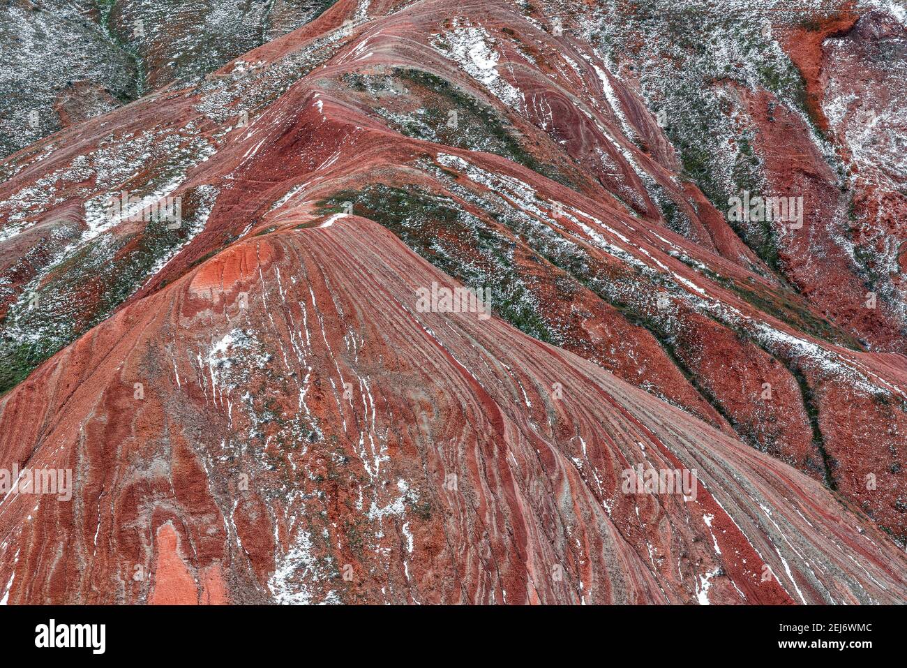 Gorgeous striped red mountains at winter Stock Photo - Alamy